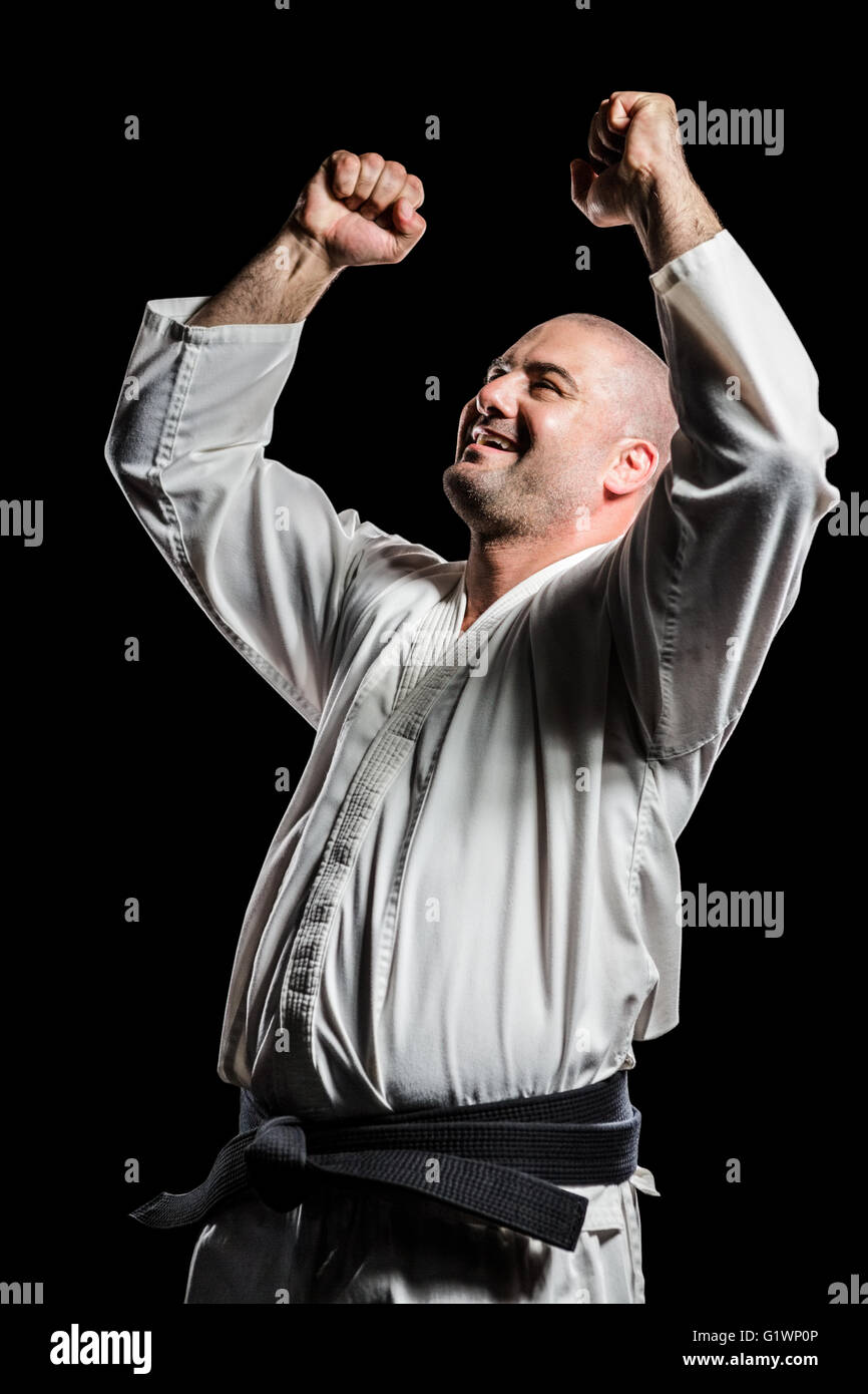 Fighter posing after victory Stock Photo - Alamy