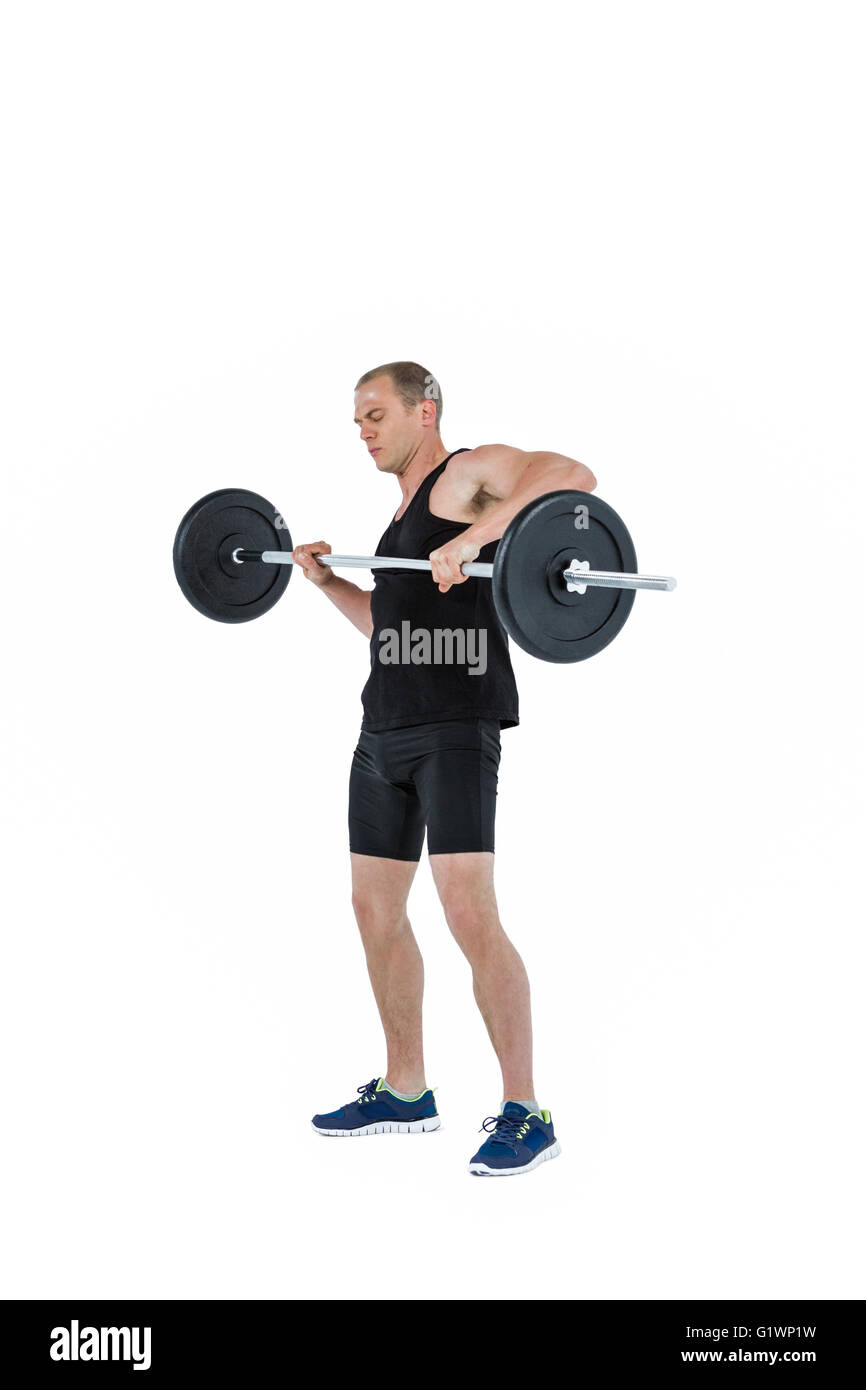 Bodybuilder lifting heavy barbell weights Stock Photo - Alamy