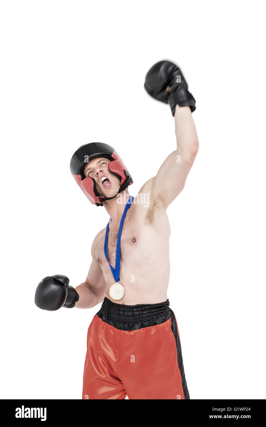 Boxer wearing gold medal performing boxing stance Stock Photo - Alamy