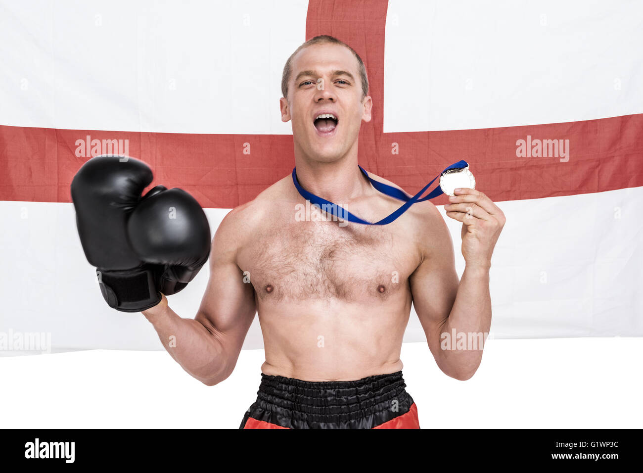 Excited boxer showing his gold medal Stock Photo - Alamy
