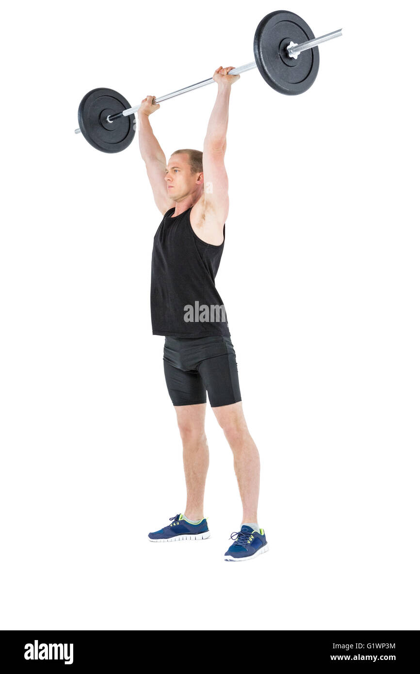 Bodybuilder lifting heavy barbell weights Stock Photo - Alamy