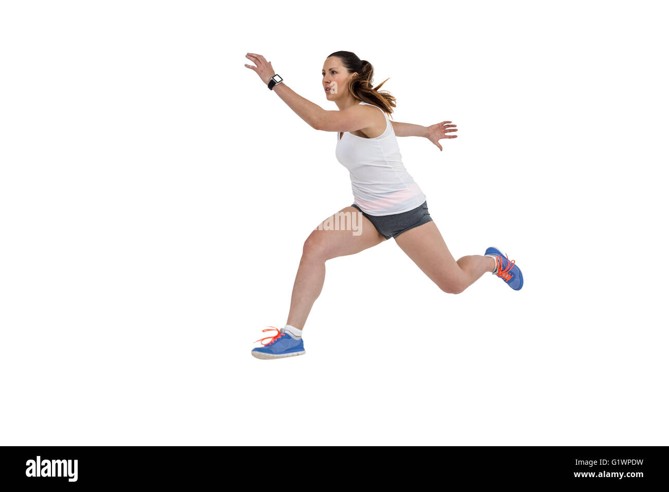 Athletic woman running on white background Stock Photo - Alamy