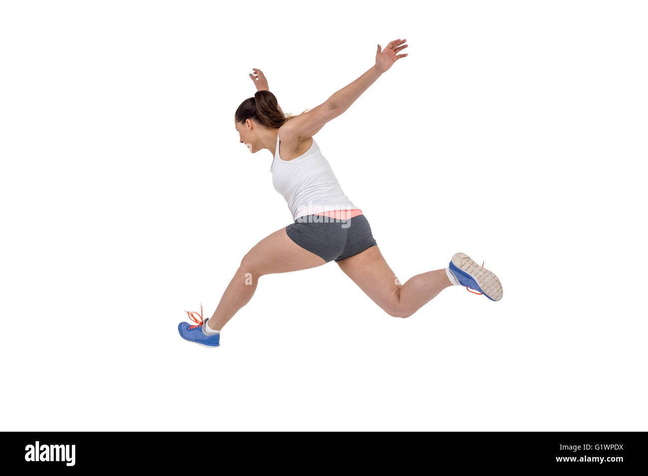 Athletic woman running on white background Stock Photo - Alamy