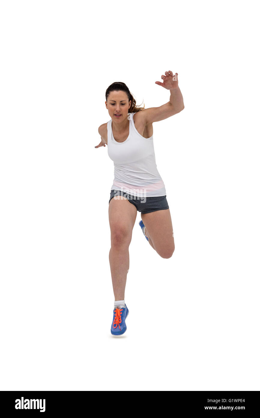 Athletic woman running on white background Stock Photo - Alamy