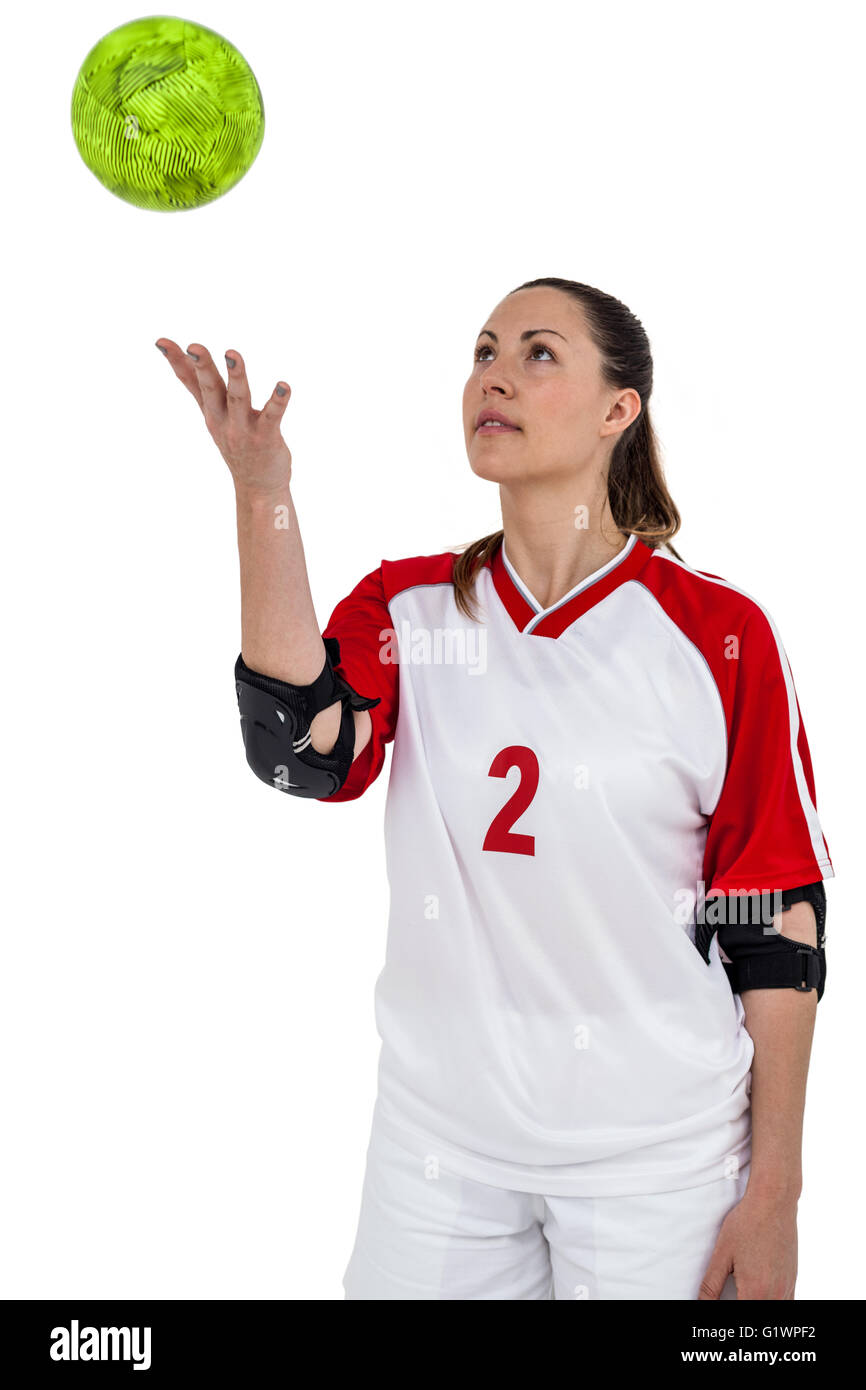 Sportswoman posing with ball Stock Photo - Alamy