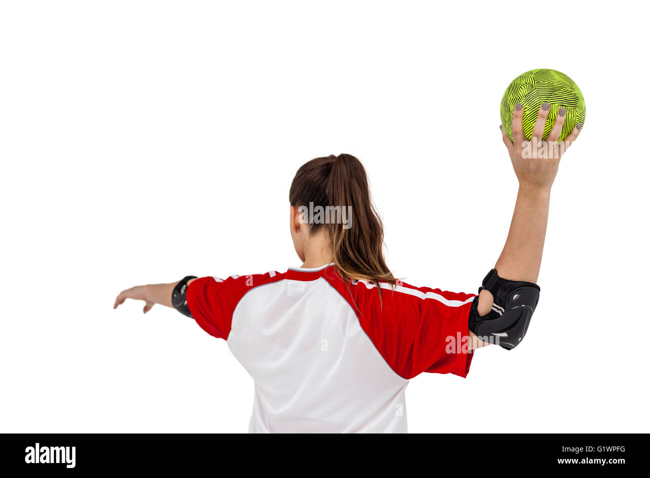 Sportswoman throwing a ball Stock Photo - Alamy