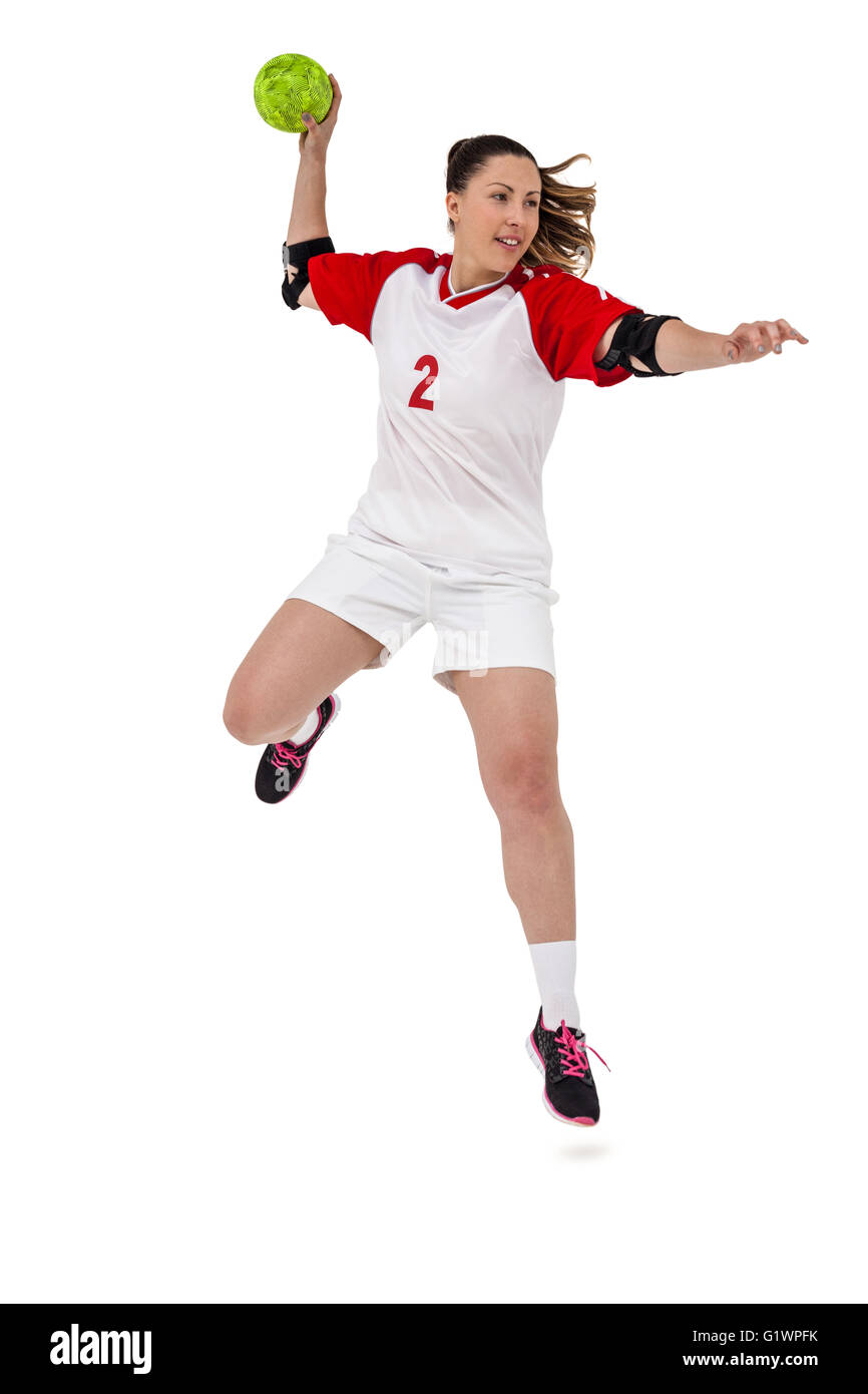 Sportswoman throwing a ball Stock Photo - Alamy