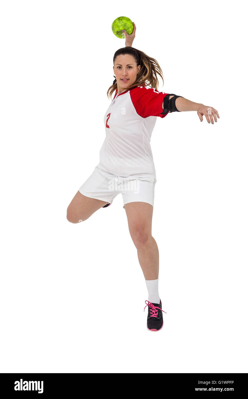 Sportswoman throwing a ball Stock Photo - Alamy