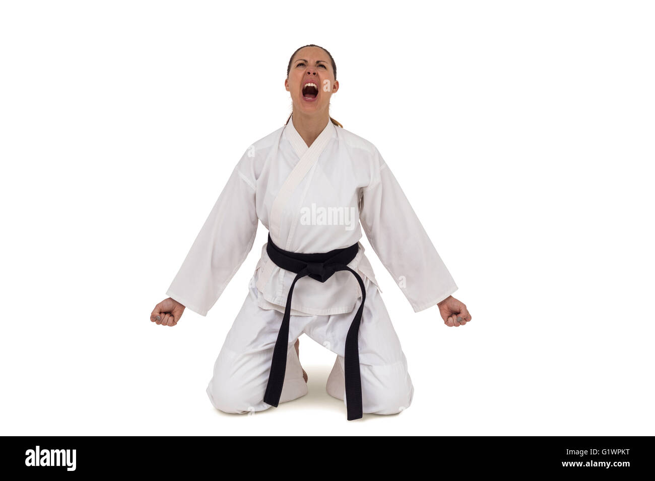 Female fighter posing after victory Stock Photo - Alamy