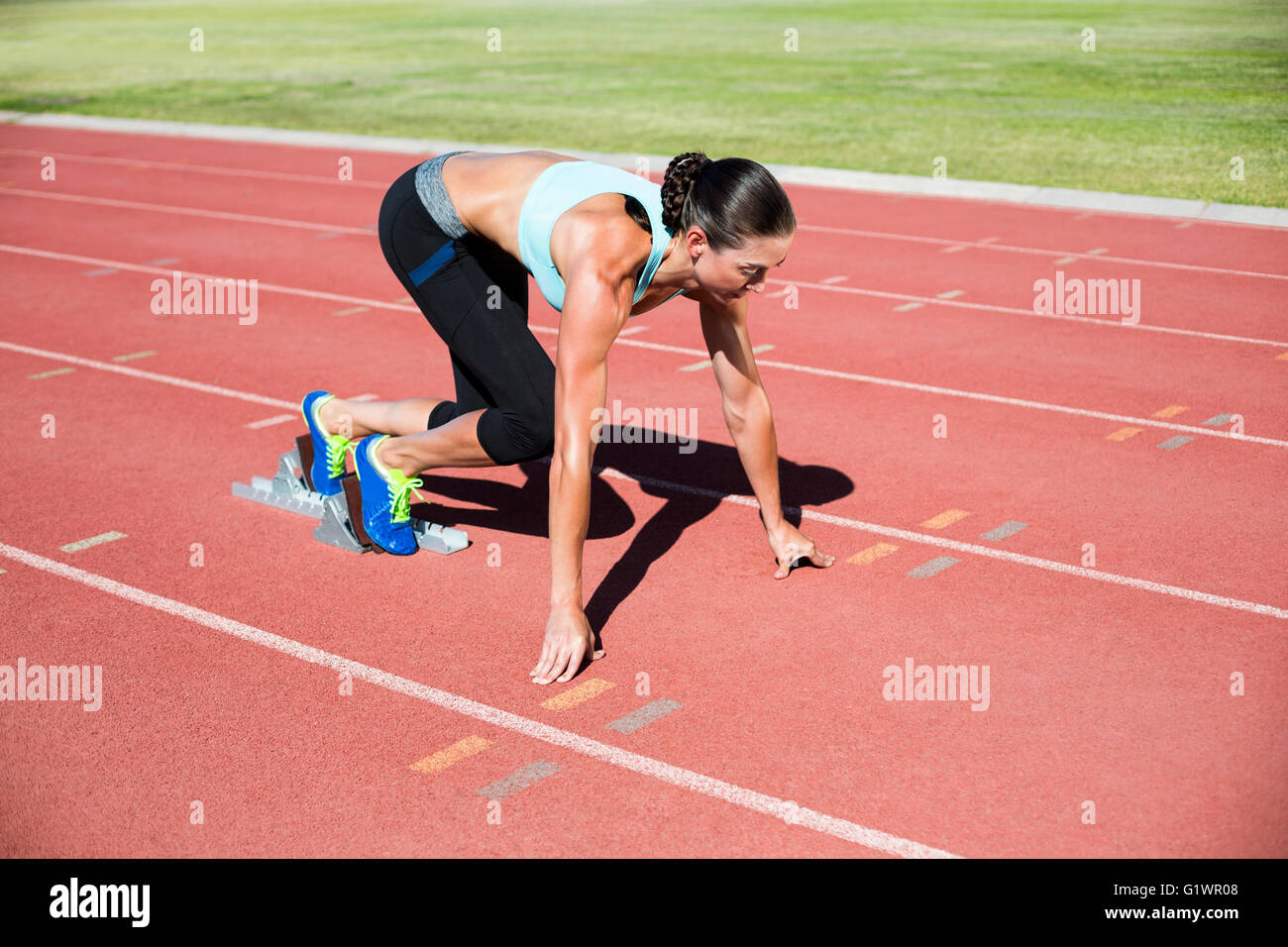 Female athlete ready to run Stock Photo - Alamy