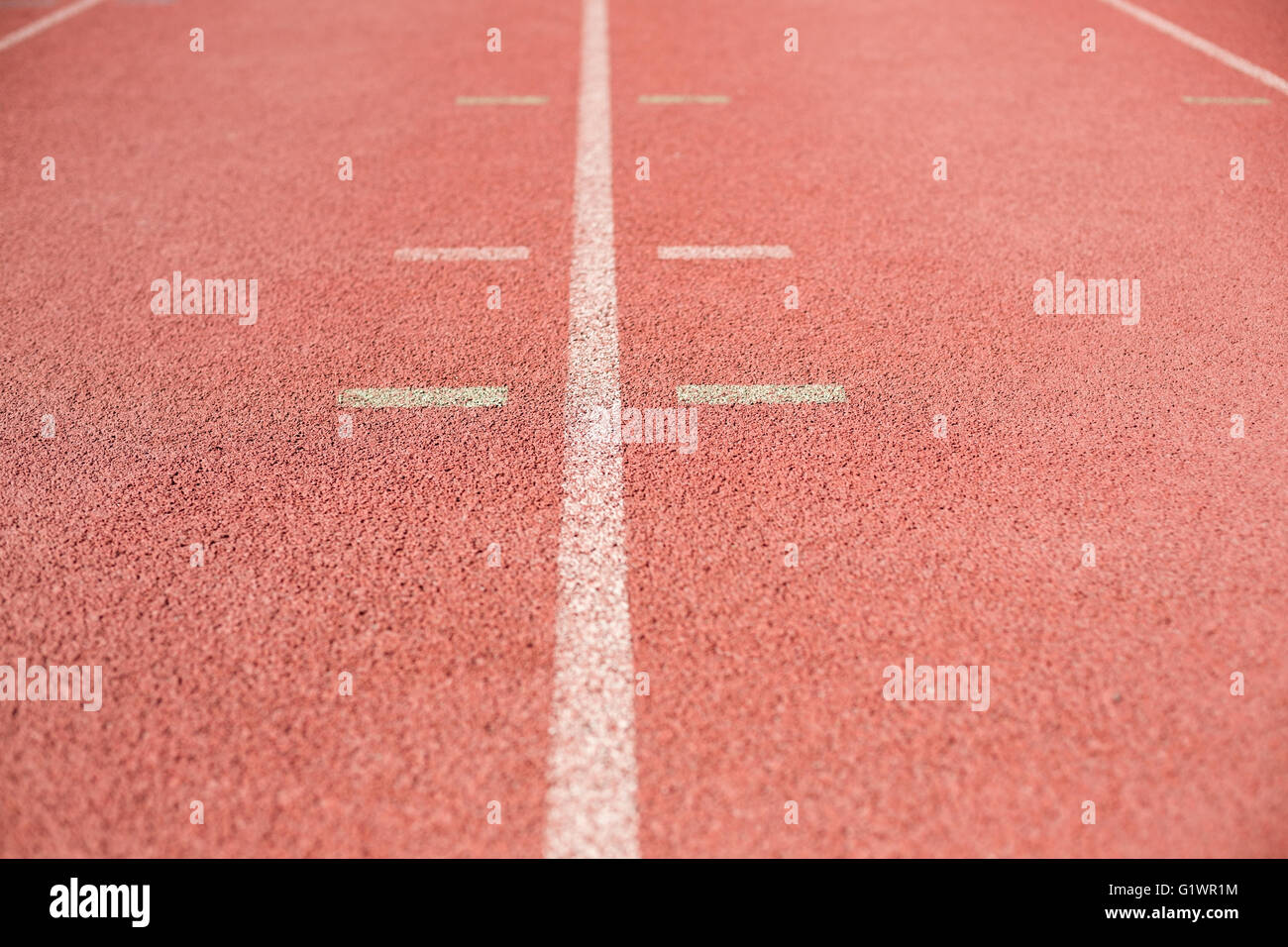 Marking line on running track Stock Photo - Alamy