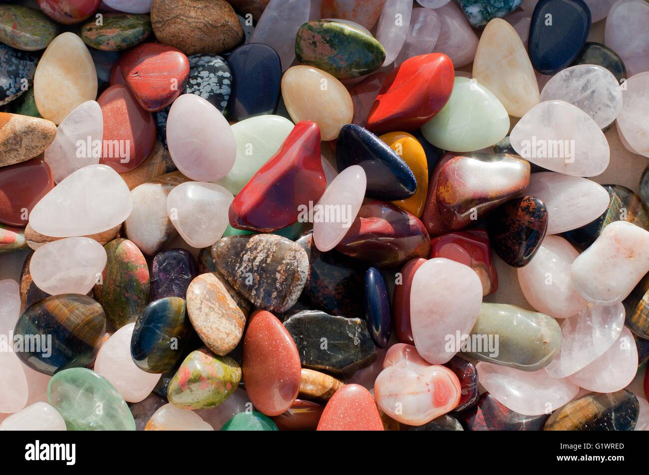 Background of colorful beach pebbles of different shape and size Stock ...