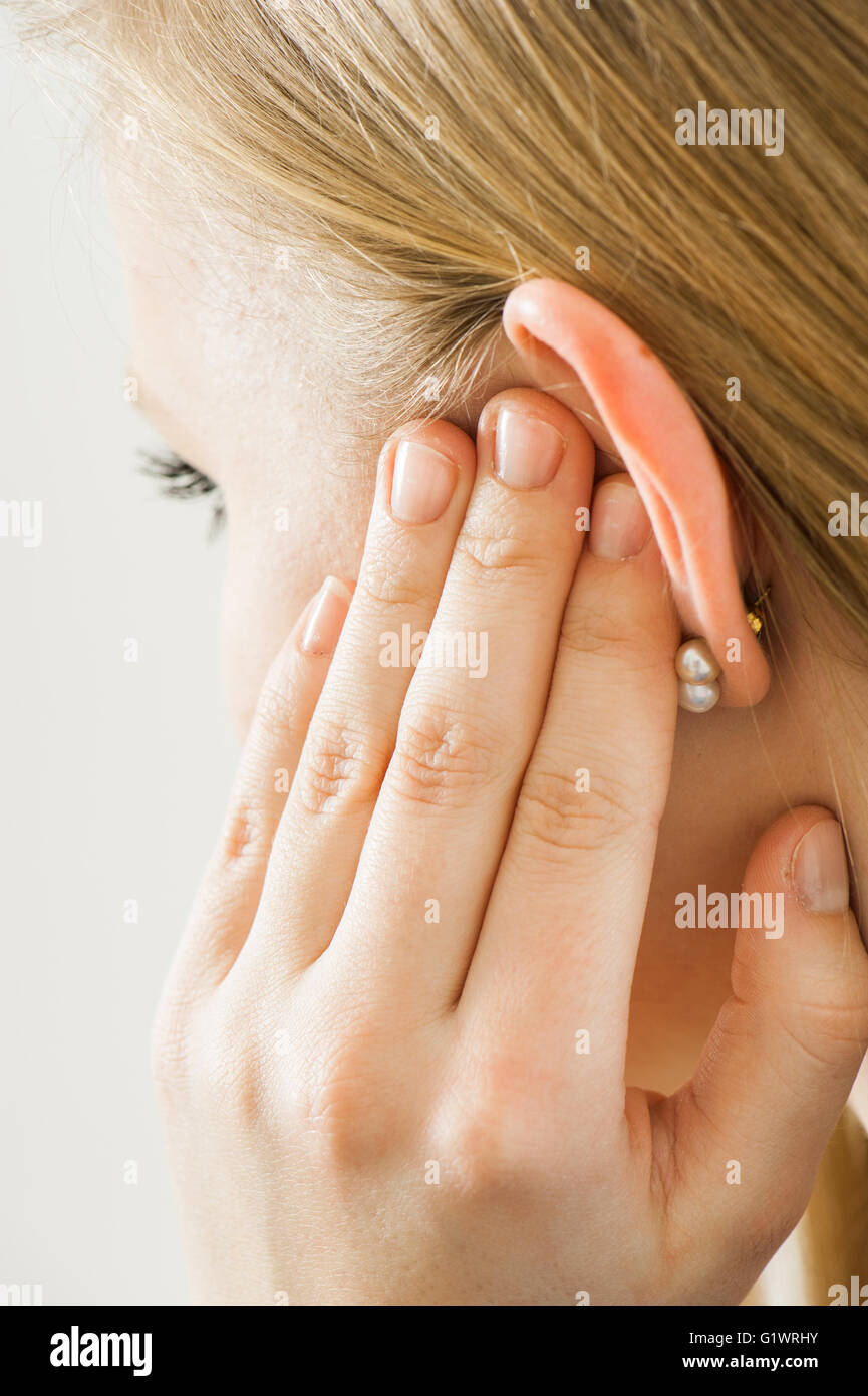 Whistling in the ear hi-res stock photography and images - Alamy