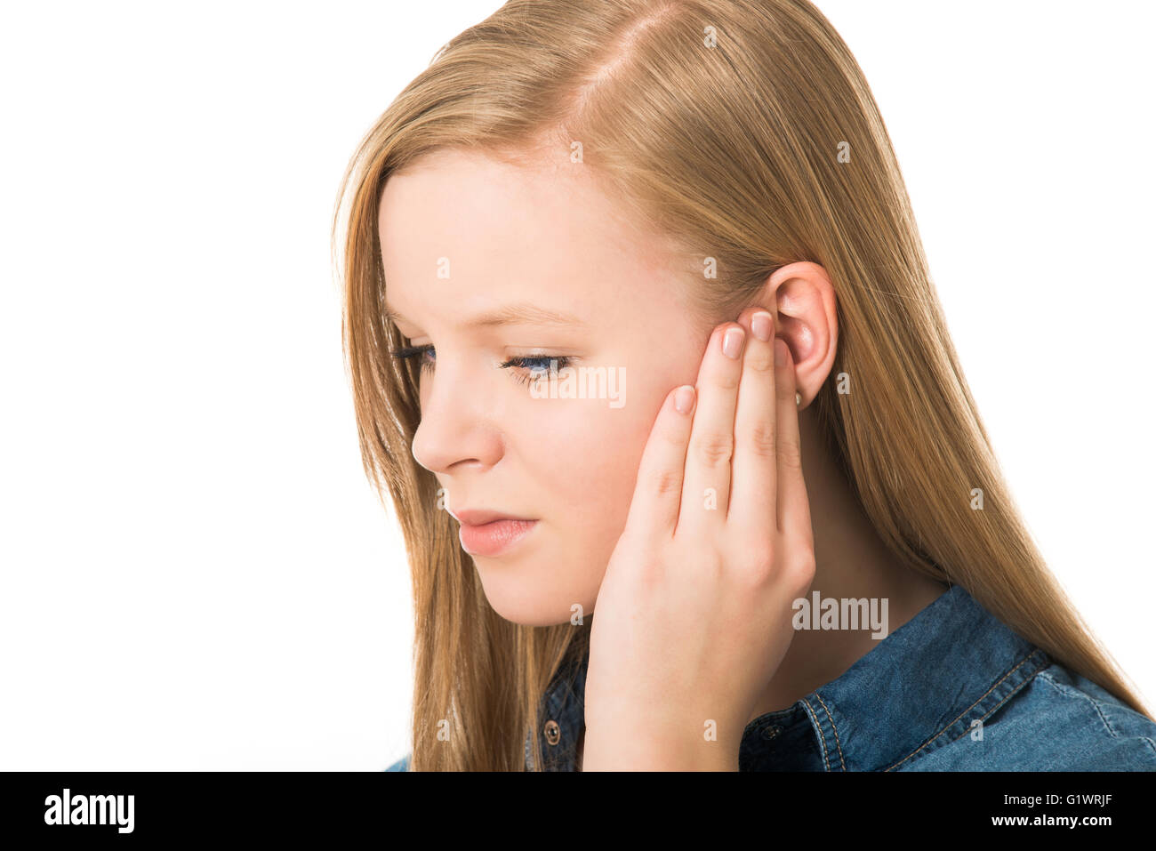Girl holds hand on your ear Stock Photo - Alamy