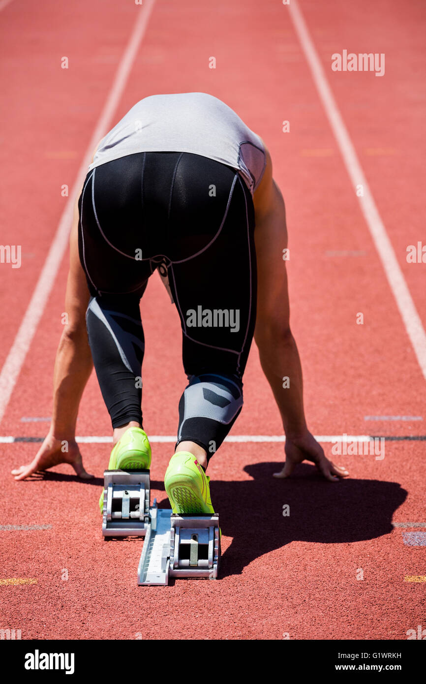 Athlete focused starting block hi-res stock photography and images - Alamy