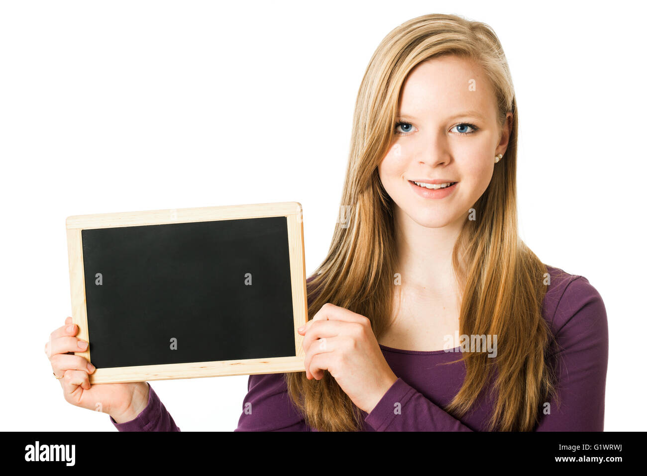 Teenage girl with chalkboard isolated on white Stock Photo - Alamy
