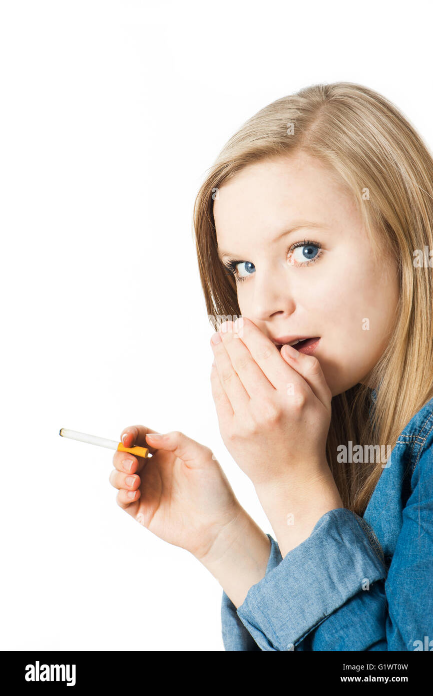 Teenage girl with cigarette isolated on white Stock Photo - Alamy