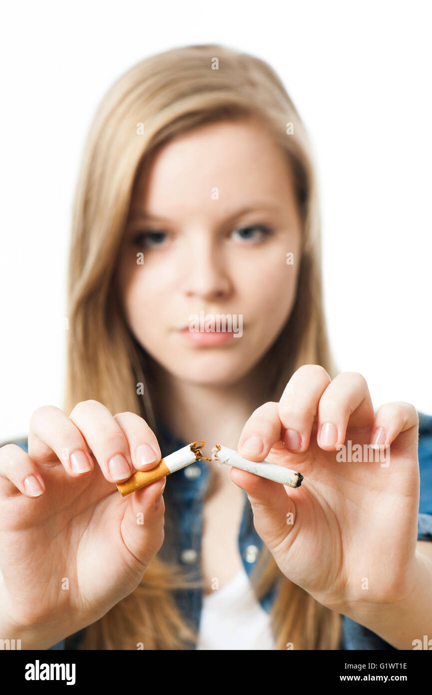Teenage girl with cigarette isolated on white Stock Photo - Alamy