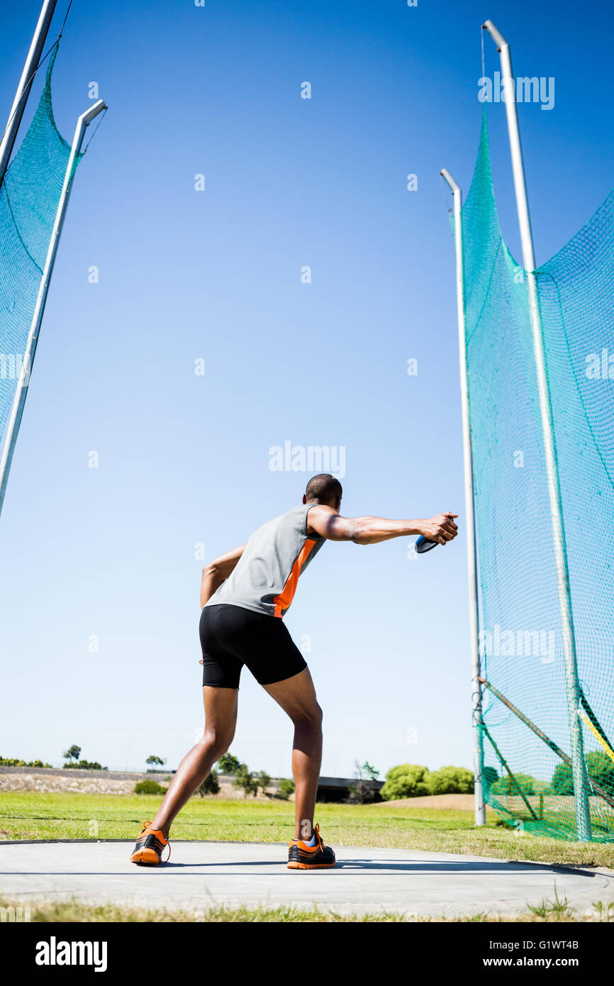Athlete about to throw a discus Stock Photo - Alamy