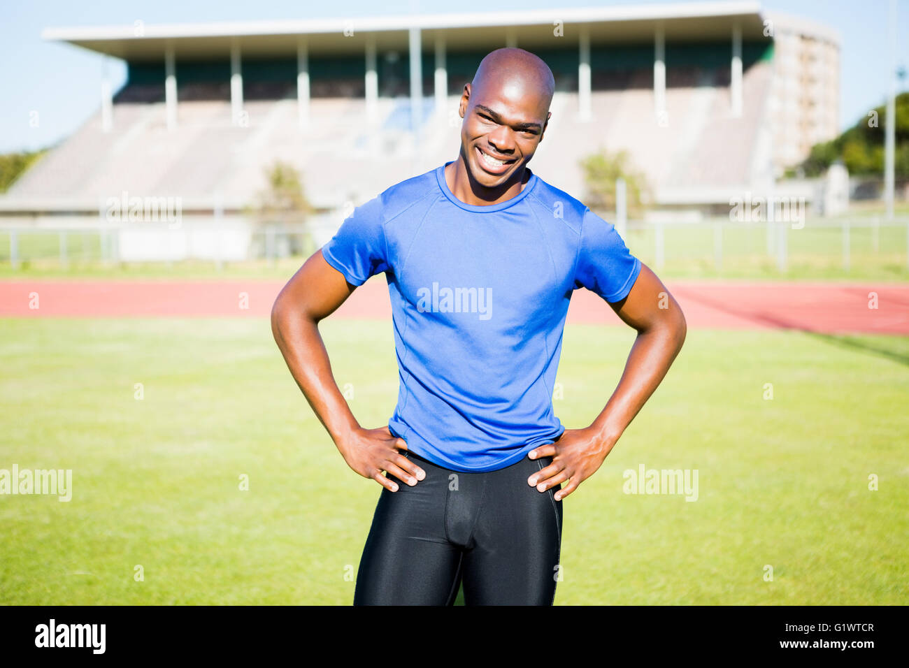 Portrait of a happy athlete Stock Photo - Alamy