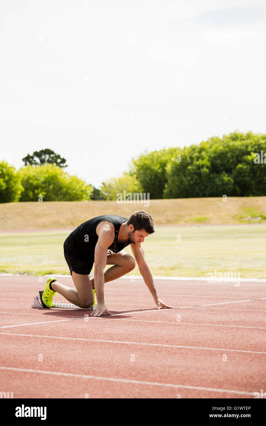 Athlete ready to run Stock Photo - Alamy