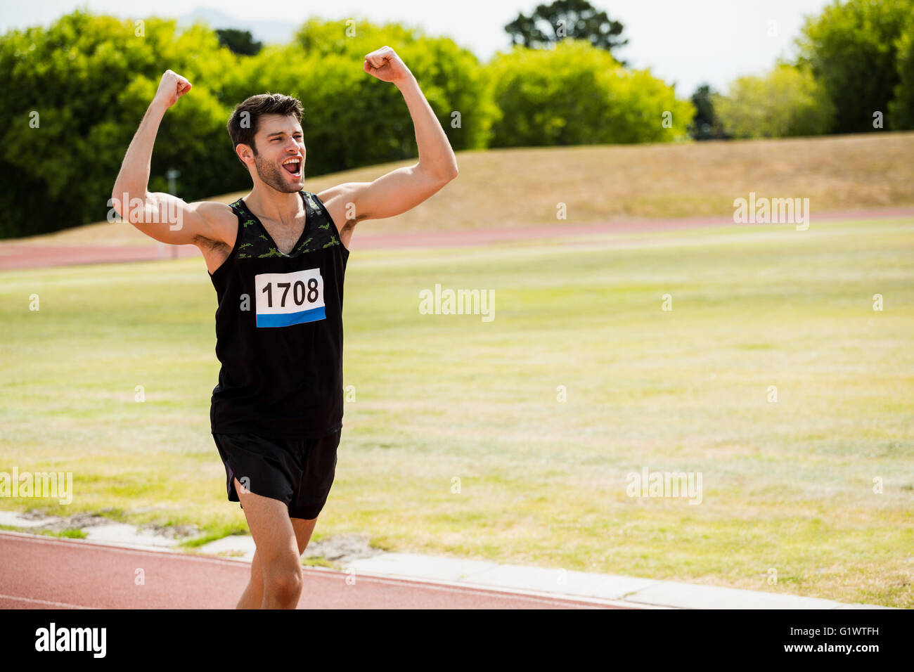 Runner athlete male happy olympics hi-res stock photography and images ...