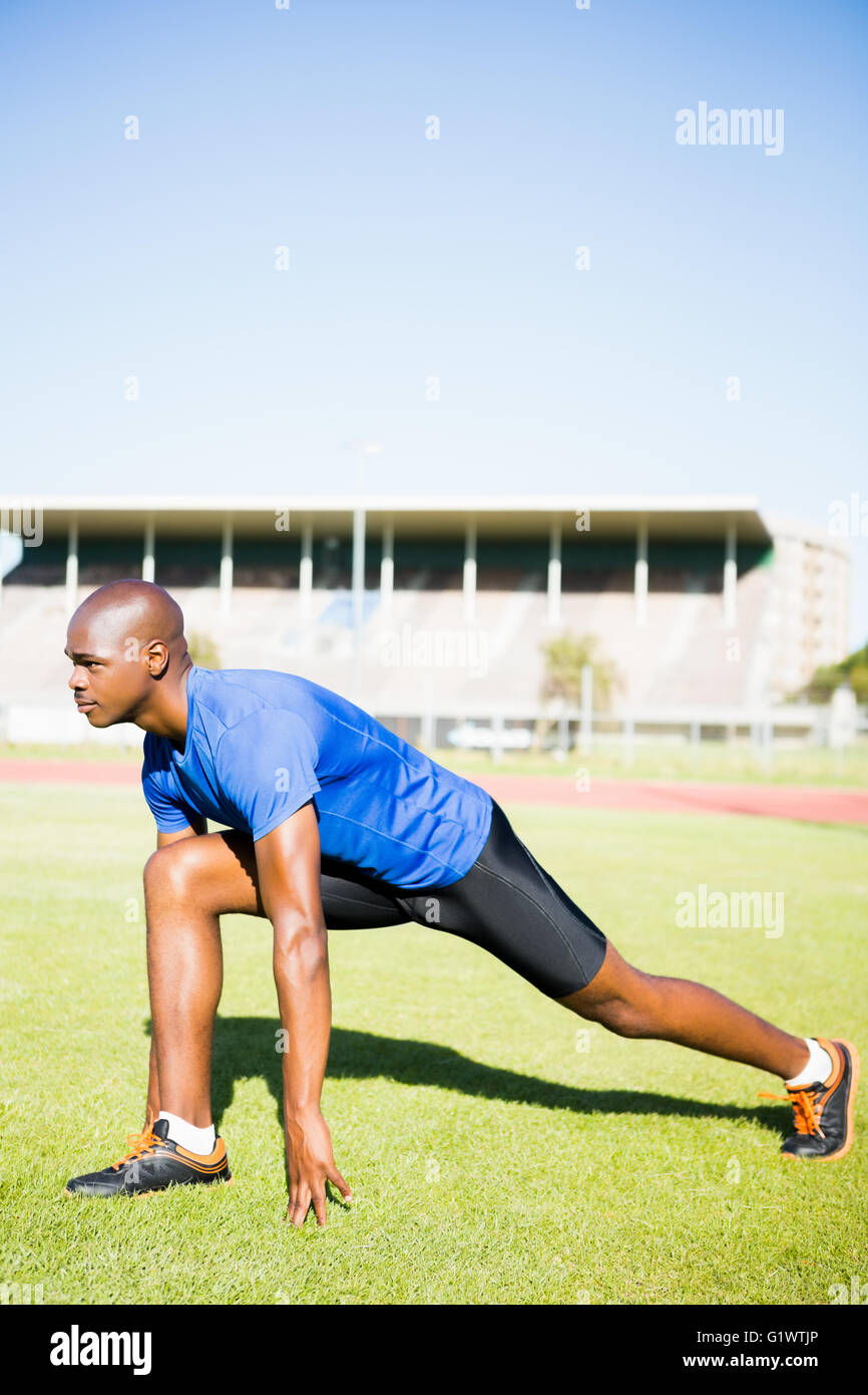 Athlete warming up in a stadium Stock Photo - Alamy