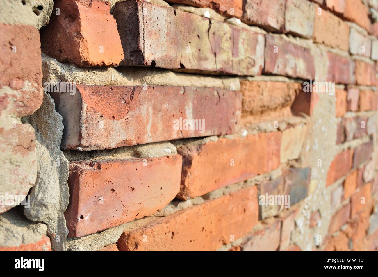 Detail of old brick wall background in perspective Stock Photo - Alamy