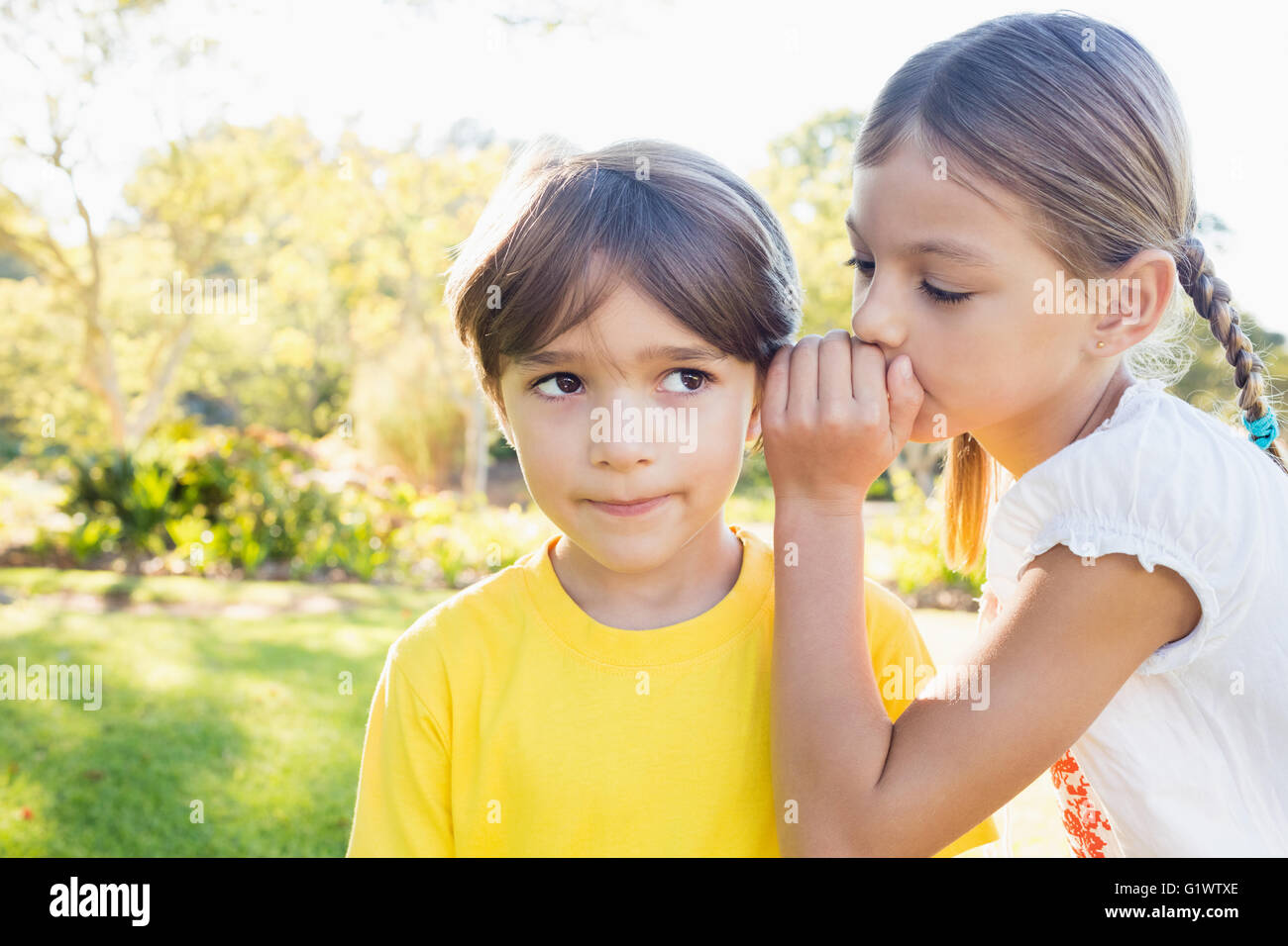 Children Telling A Secret