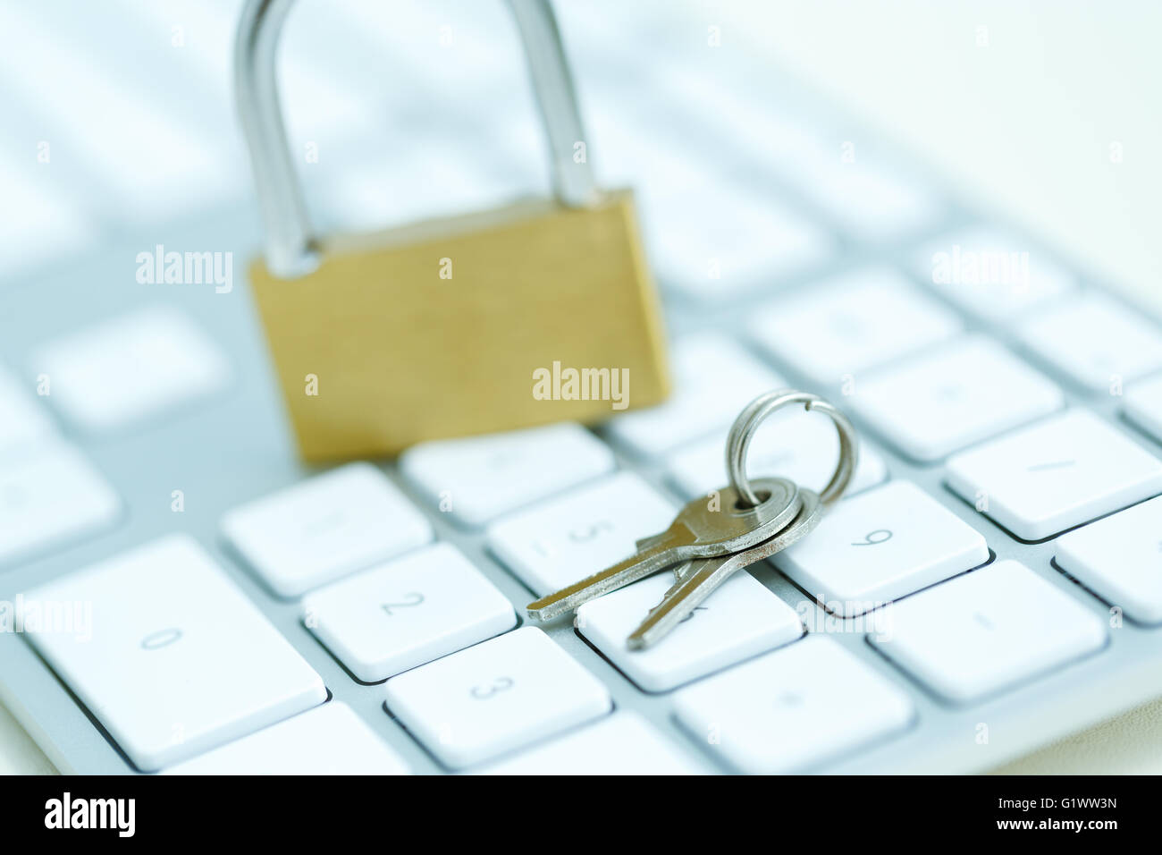 Security lock on white computer keyboard - computer security breach ...