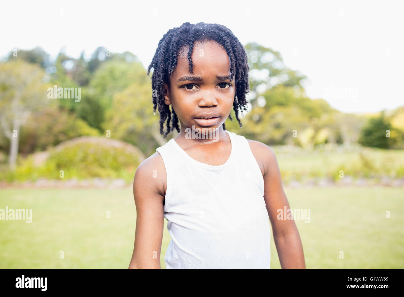 Kid posing at camera during a sunny day Stock Photo - Alamy