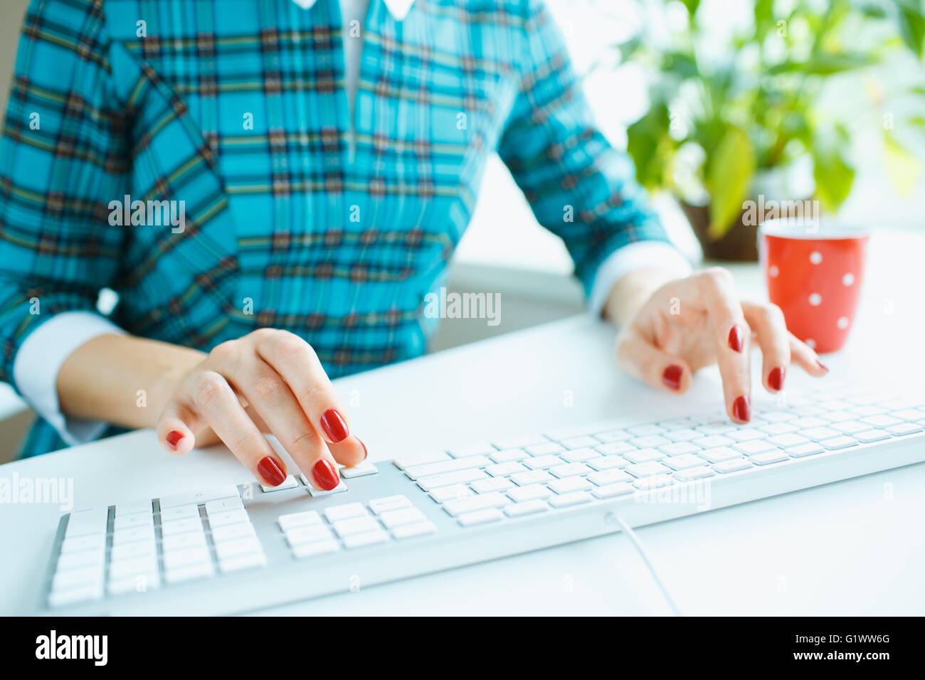 Female hands or woman office worker typing on the keyboard Stock Photo ...