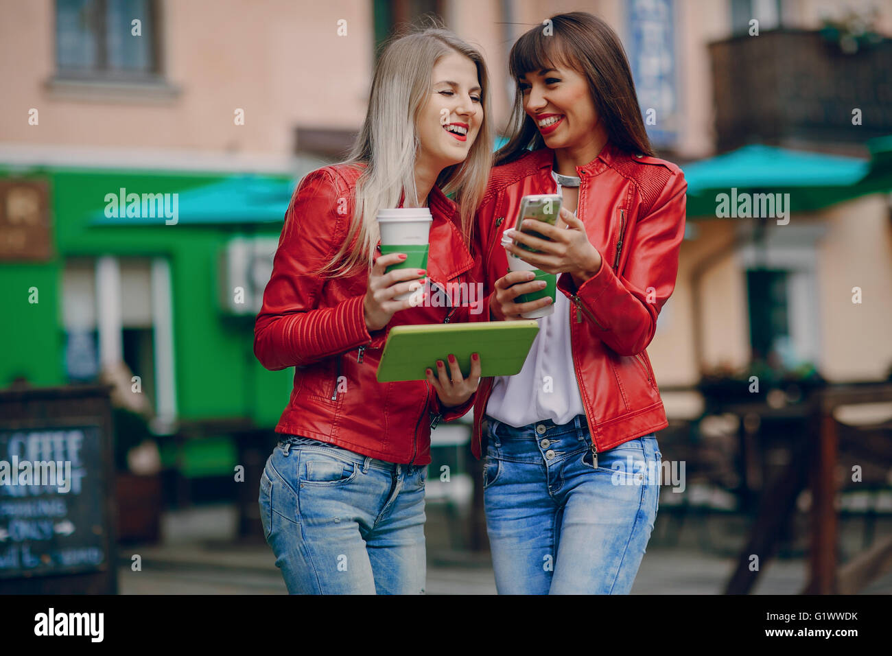 girls with phone Stock Photo - Alamy