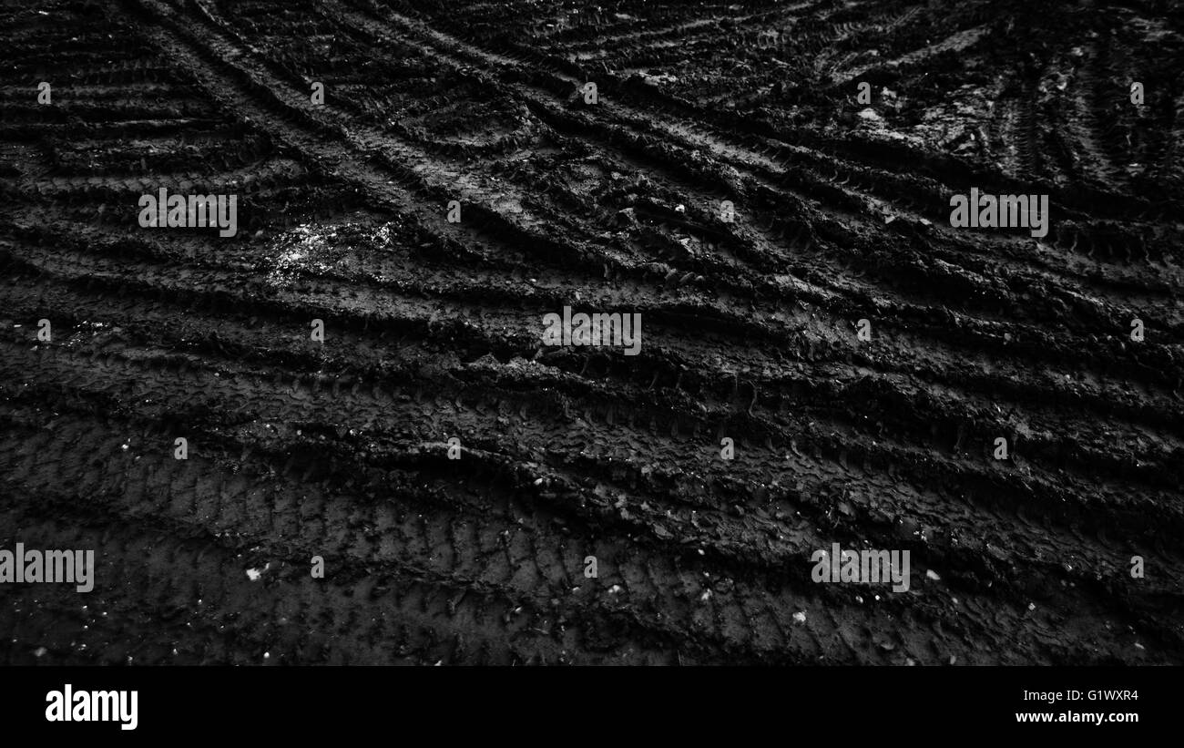 Black mud ground texture or background close up Stock Photo - Alamy