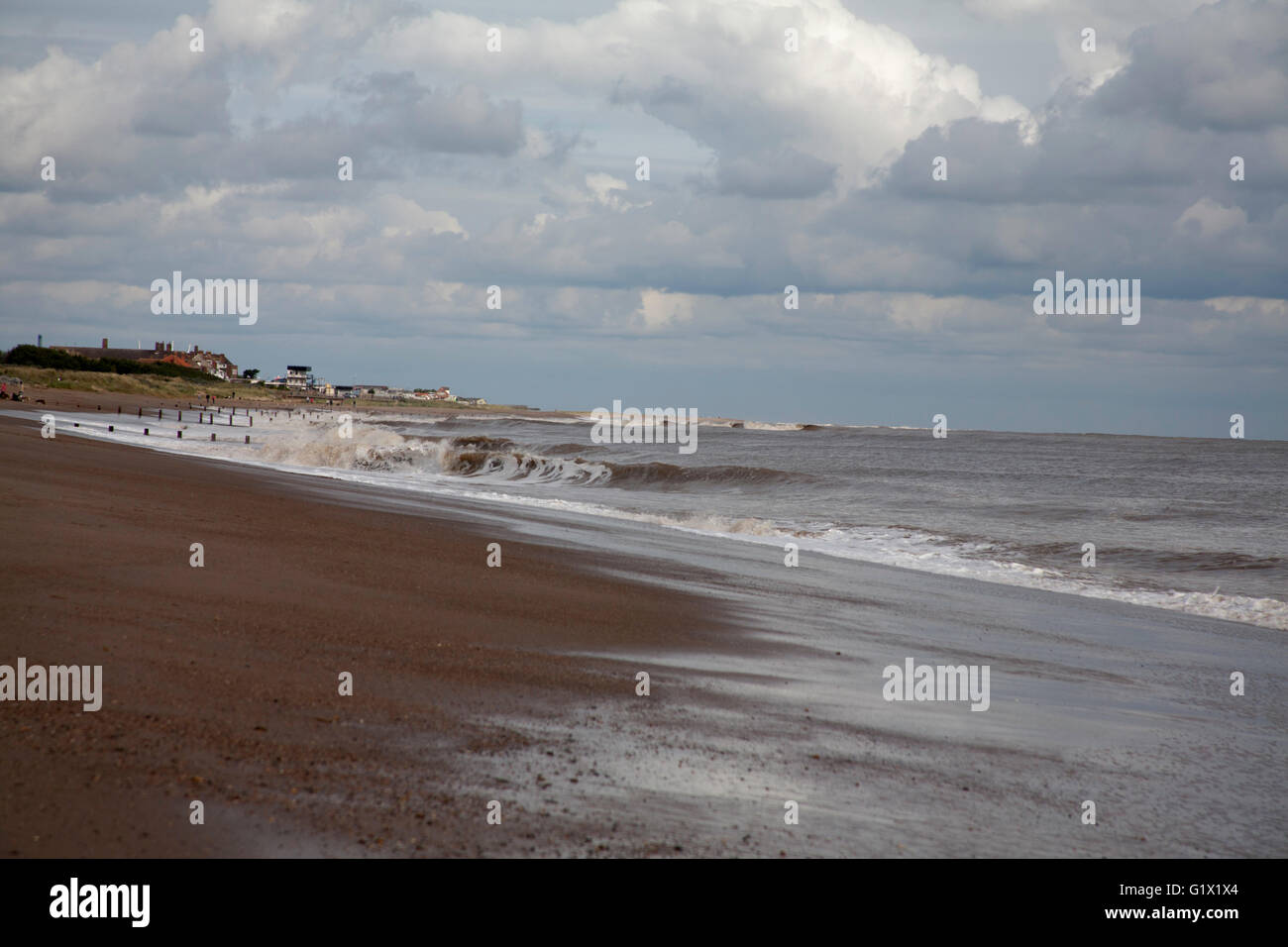 Waves breaking against the beach Skegness Lincolnshire England Stock ...