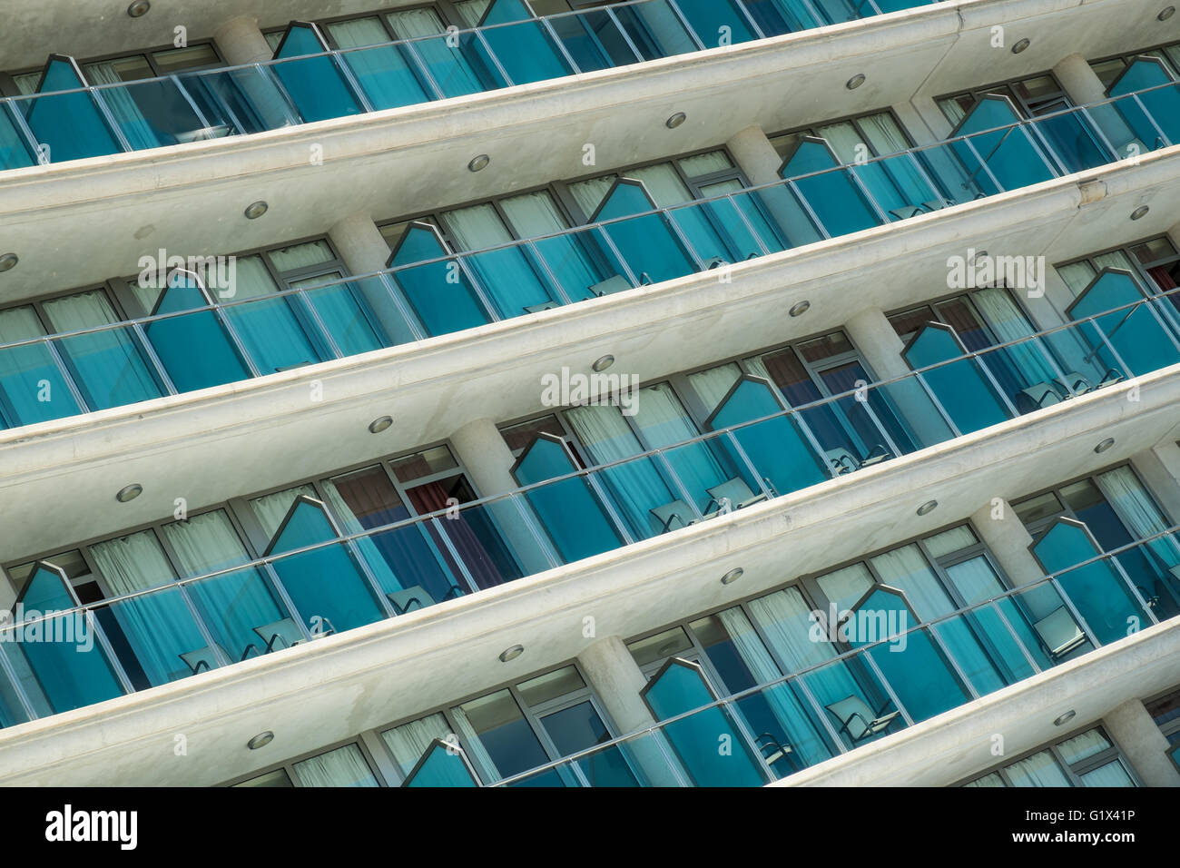 Full frame take of a high rise building balcony facade Stock Photo - Alamy