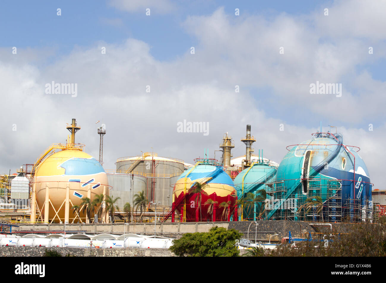 Industry vertical steaming pipe. Group of colored tubes Stock Photo - Alamy