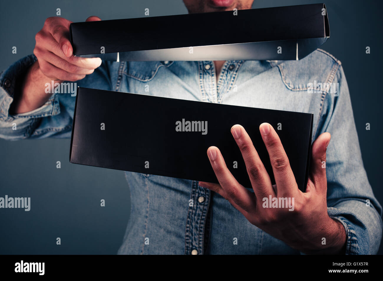 Man inside a box hi-res stock photography and images - Alamy