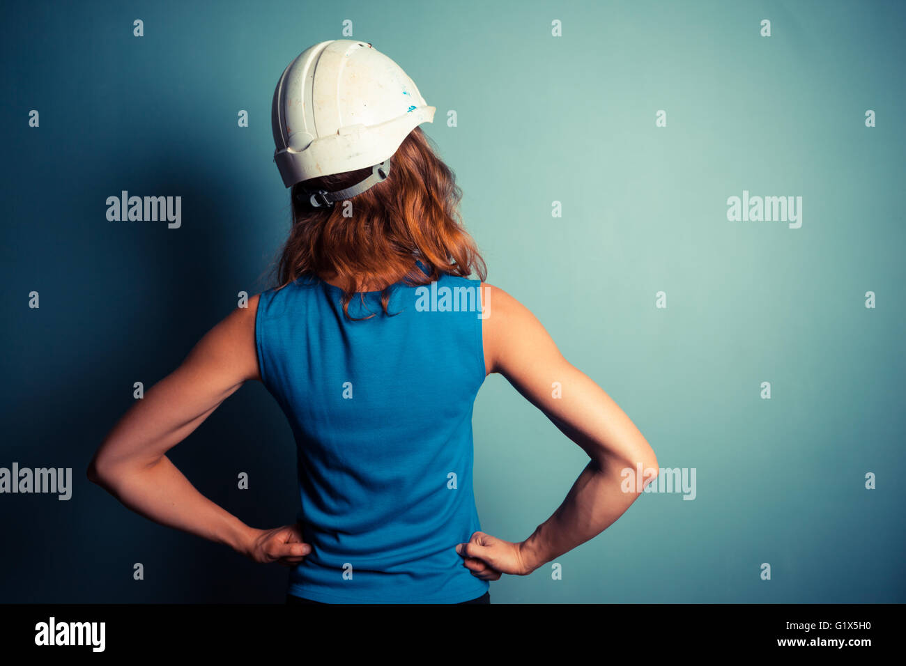 Young woman wearing hard hat hi-res stock photography and images - Alamy