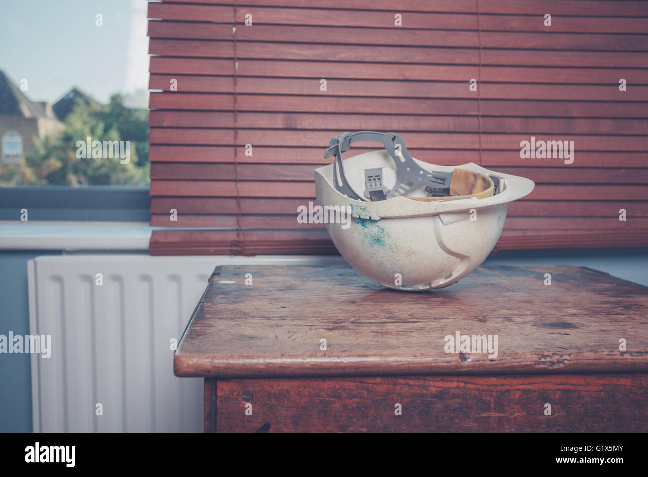 A safety helmet on a table Stock Photo - Alamy