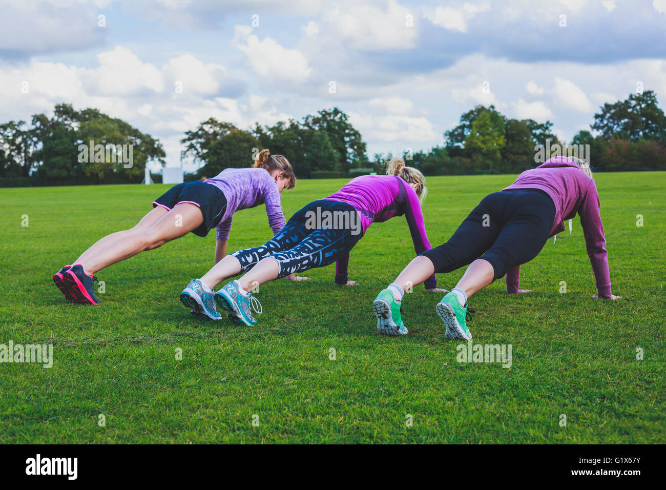 Push up park friends hi-res stock photography and images - Alamy