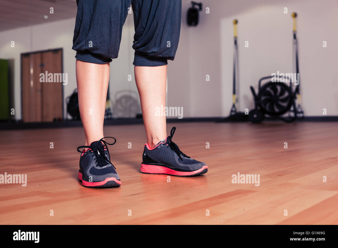 A young woman's feet as she is standing in a dance studio Stock Photo ...