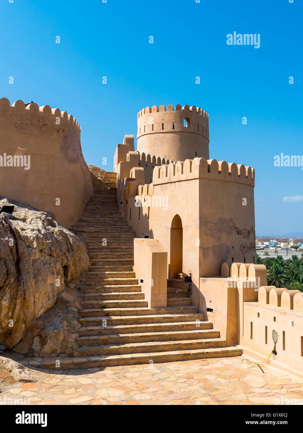 Fort Nakhl, or Husn Al Heem, fortress, above oasis Nakhl on Jebel Nakhl ...