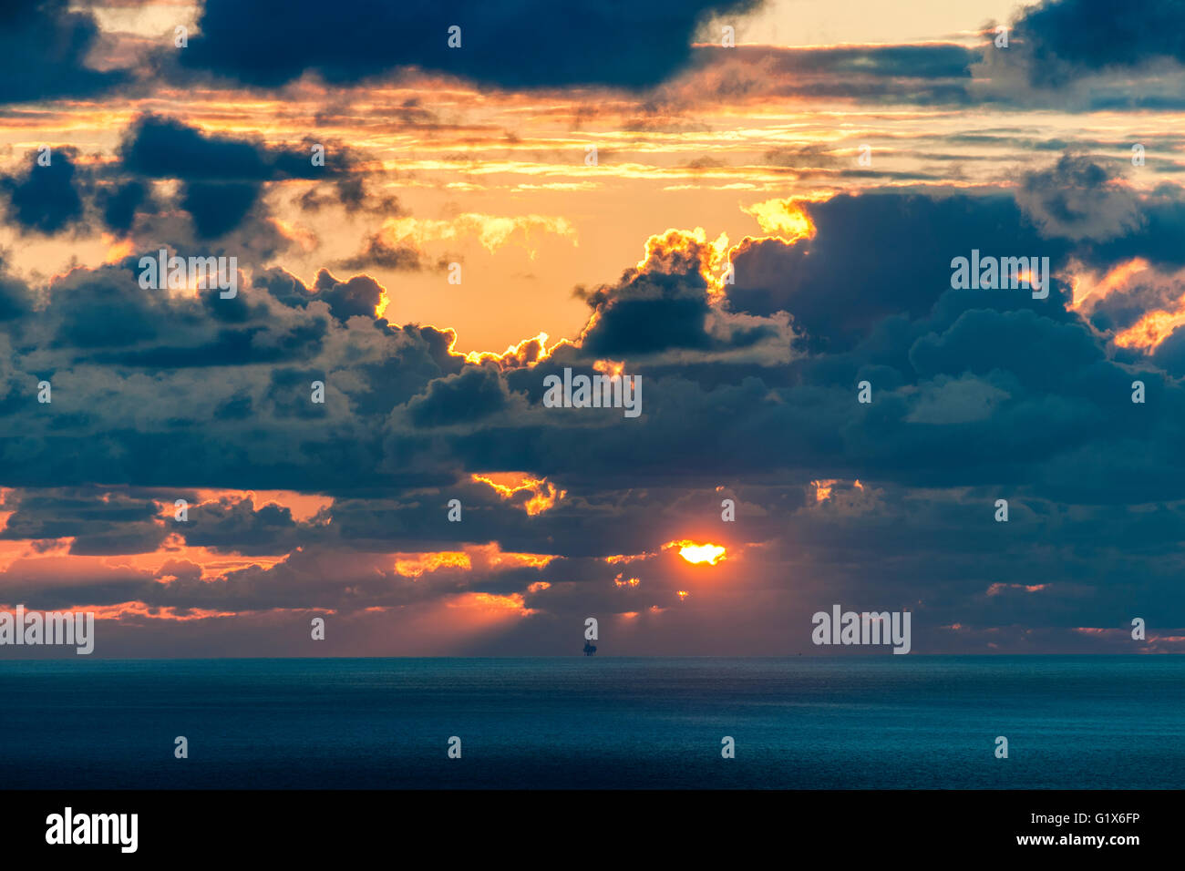 Evening mood, dramatic cloudy sky at sunset over the sea, San Sebastian ...