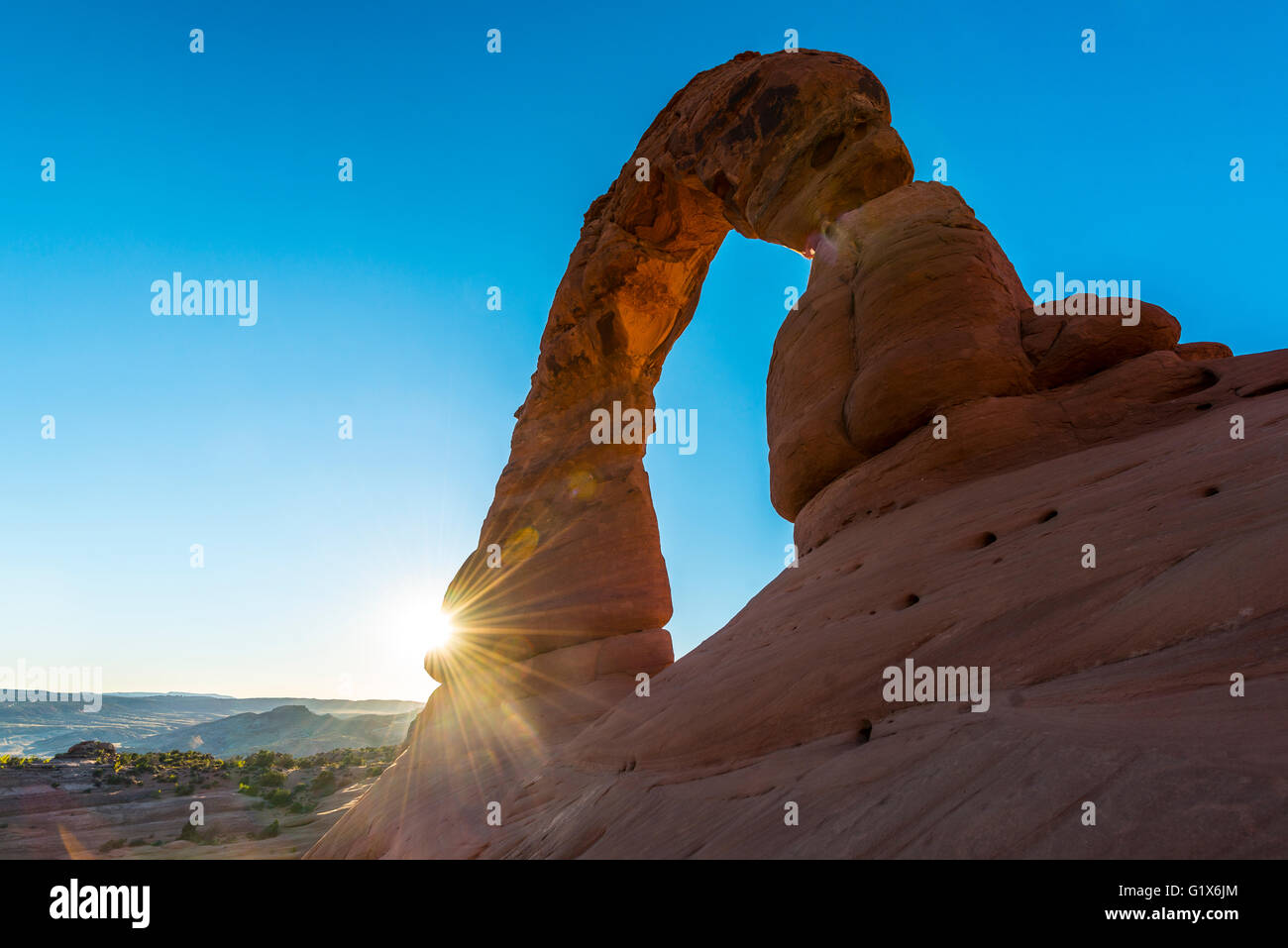 Natural Arch Delicate Arch at sunset, Arches National Park, Moab, Utah ...