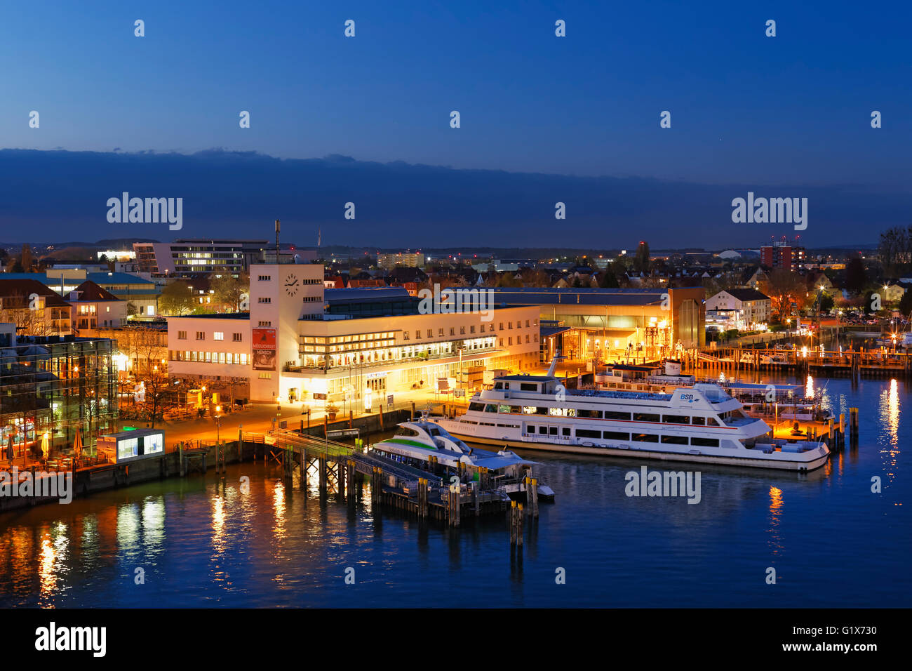 Port and Zeppelin Museum at dusk, view from Moleturm, Friedrichshafen ...