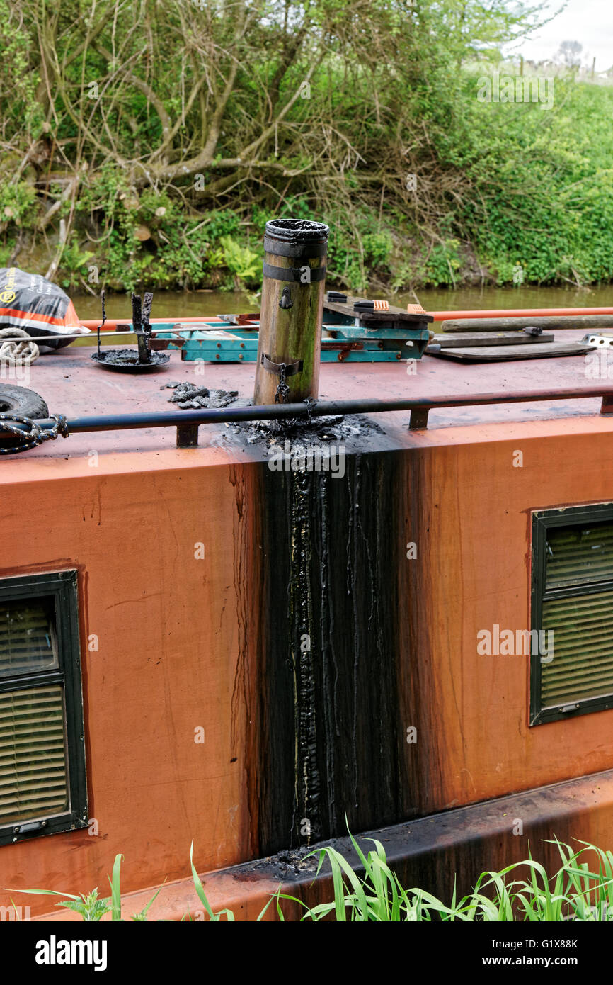 narrowboat chimney with tar overspill onto boat side Stock Photo - Alamy