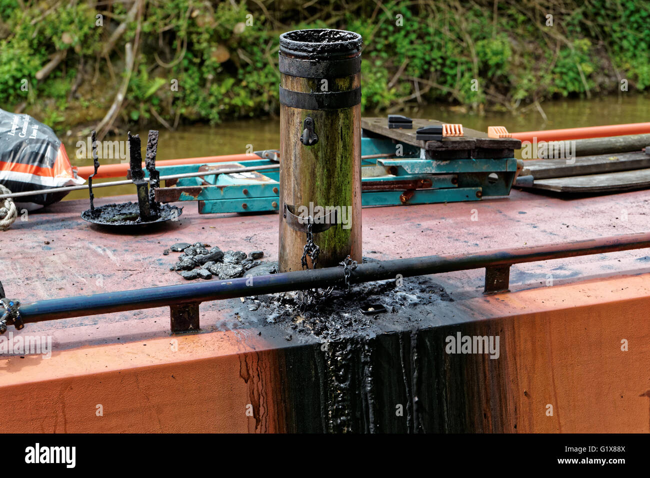 narrowboat chimney with tar overspill onto boat side Stock Photo - Alamy