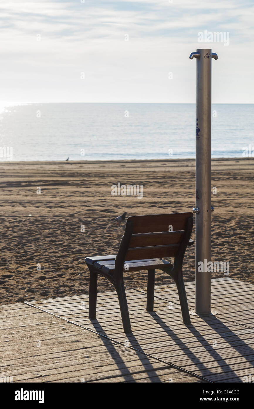 Empty Wooden Bench On Seafront High Resolution Stock Photography and ...