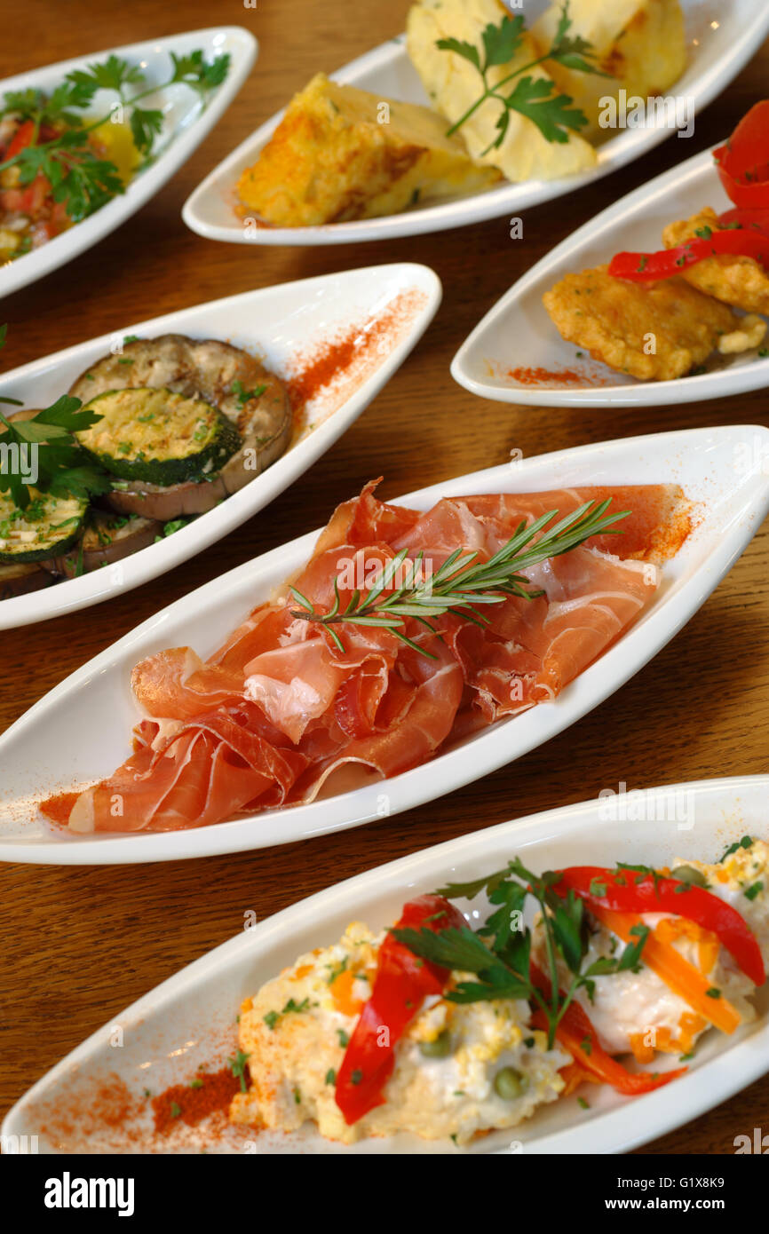 Photo of a table full of Spanish tapas Stock Photo - Alamy